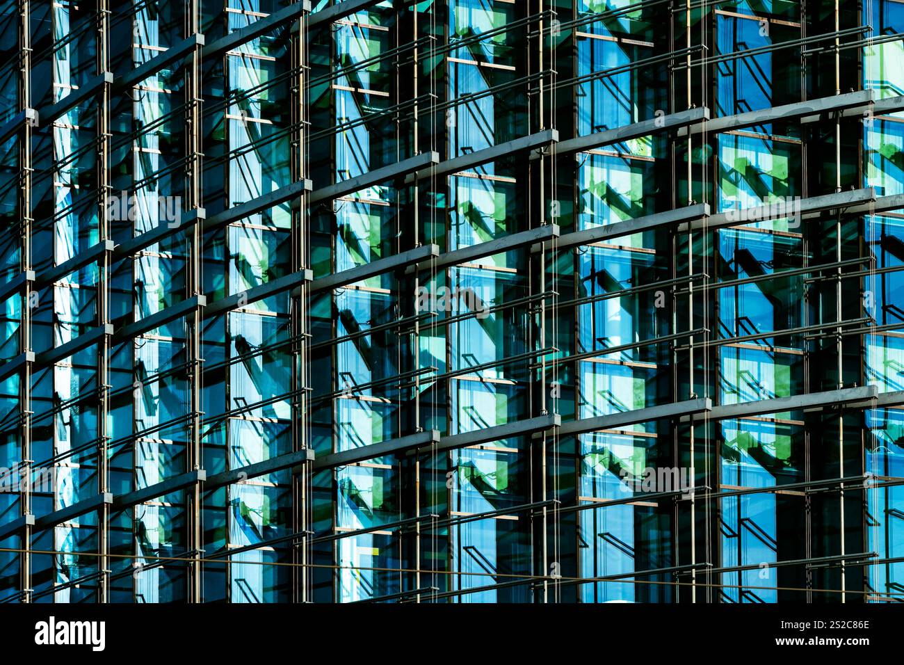 Glass Building Facade with Complex Steel Framework and Reflective Blue ...
