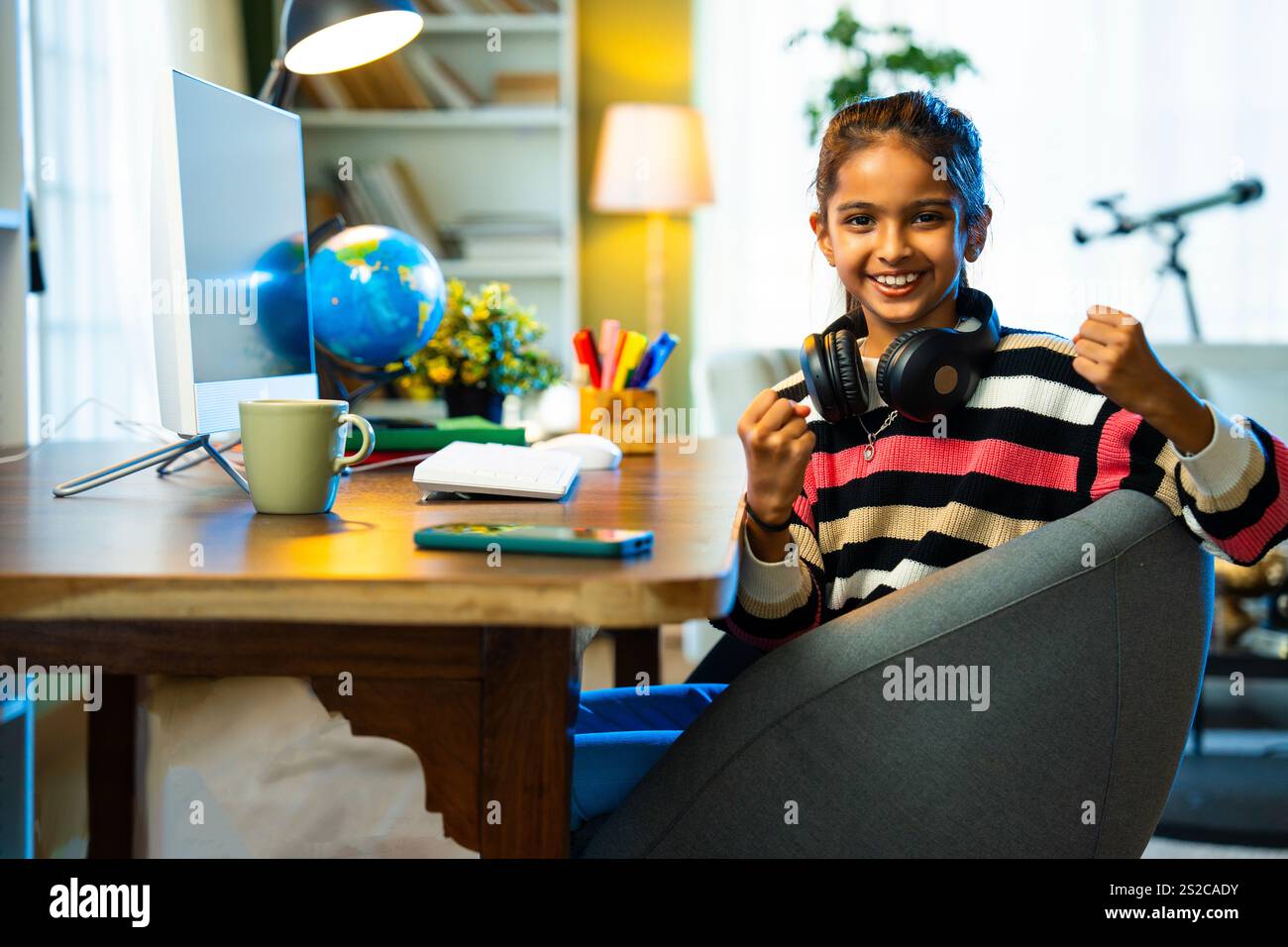 Studious Indian Asian Elementary Grade Girl Attending Virtual Online ...