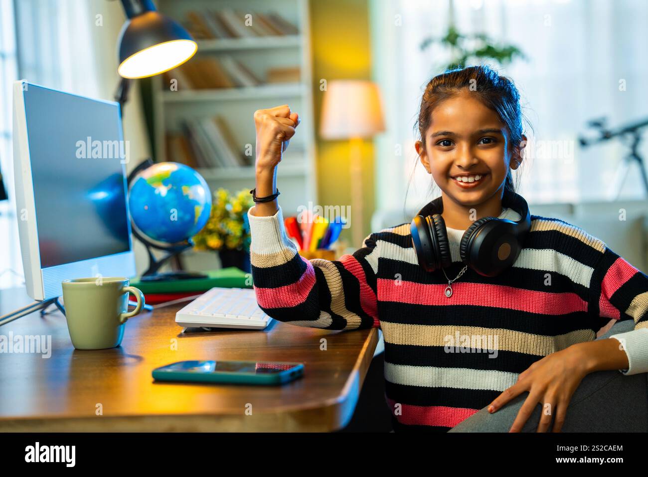 Studious Indian Asian Elementary Grade Girl Attending Virtual Online ...