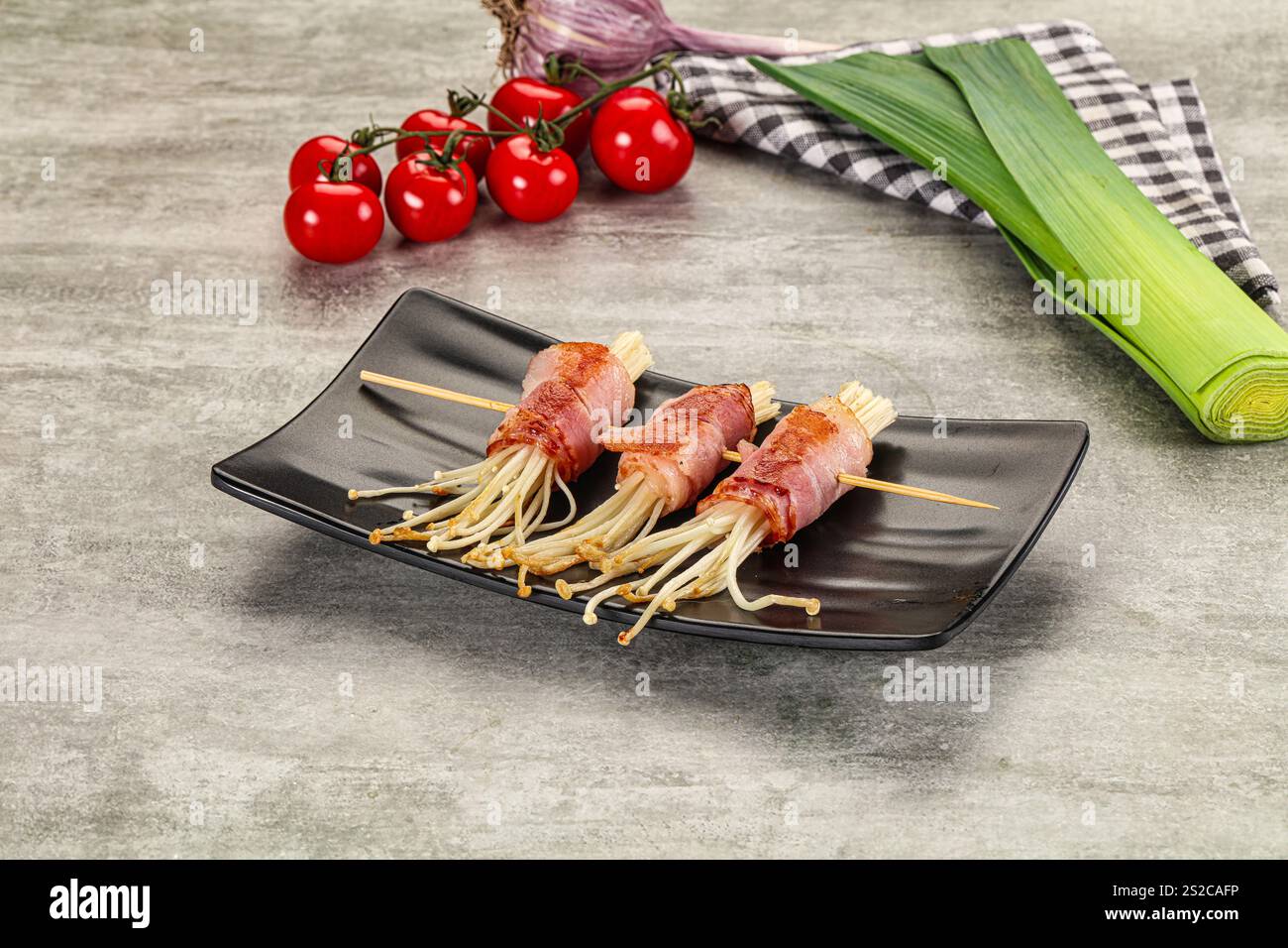 Grilled enoki mushroom with bacon roll wrap Stock Photo - Alamy