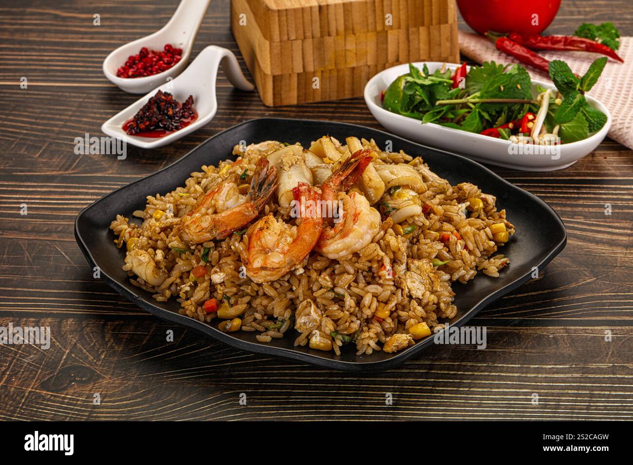 Vietnamese traditional fried rice with prawn and squid - Kom Ran Stock ...