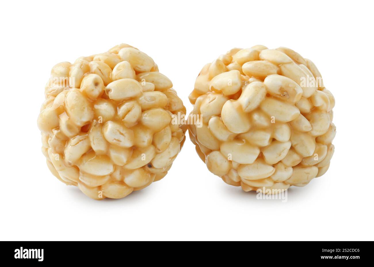 Delicious puffed rice balls isolated on white Stock Photo - Alamy