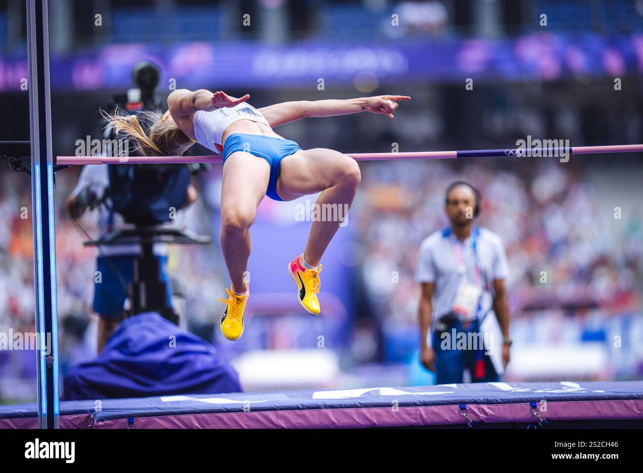 Michaela Hrubá participating in the high jump at the Paris 2024 Olympic ...