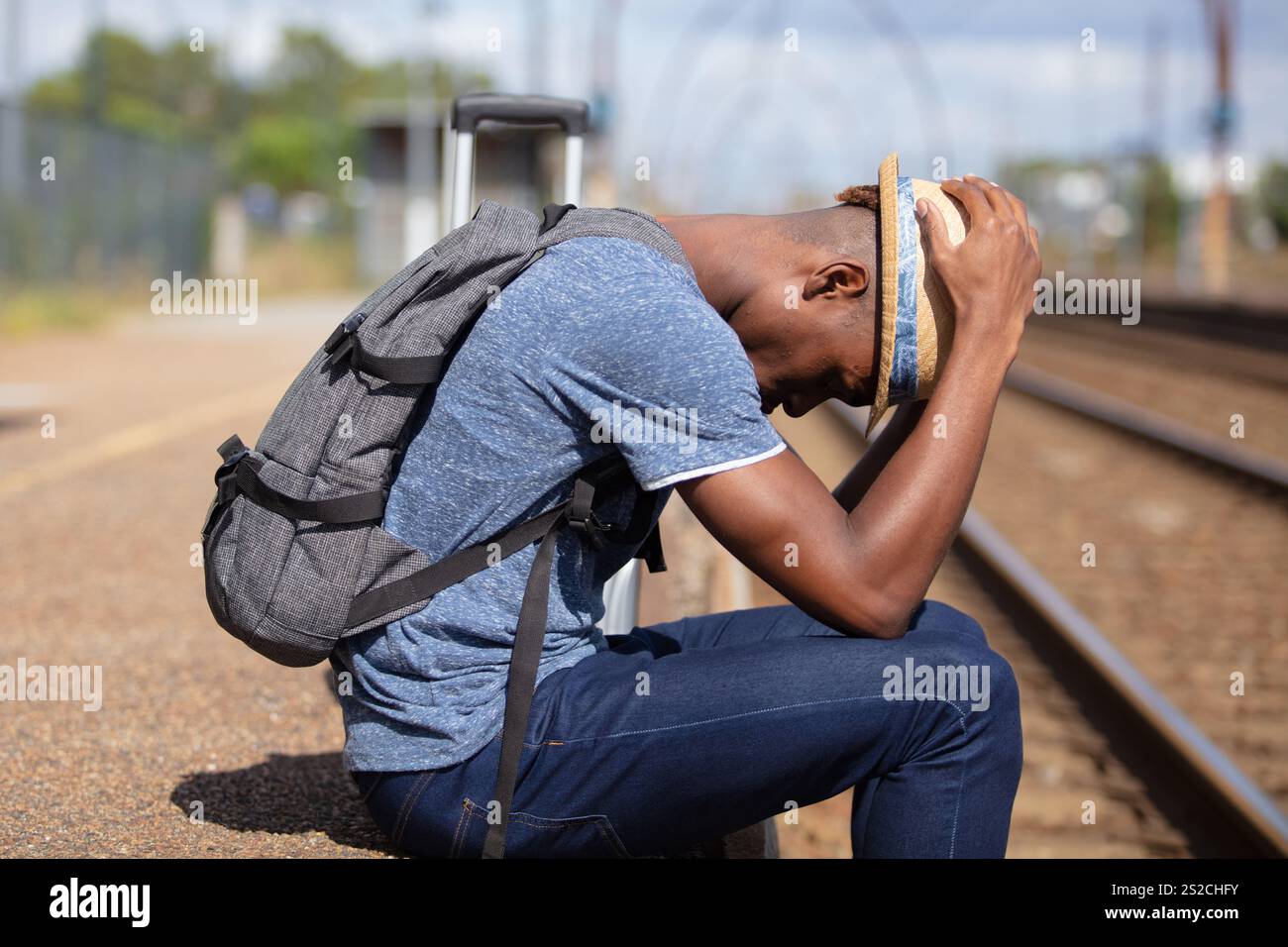 young sad man missed his train Stock Photo - Alamy