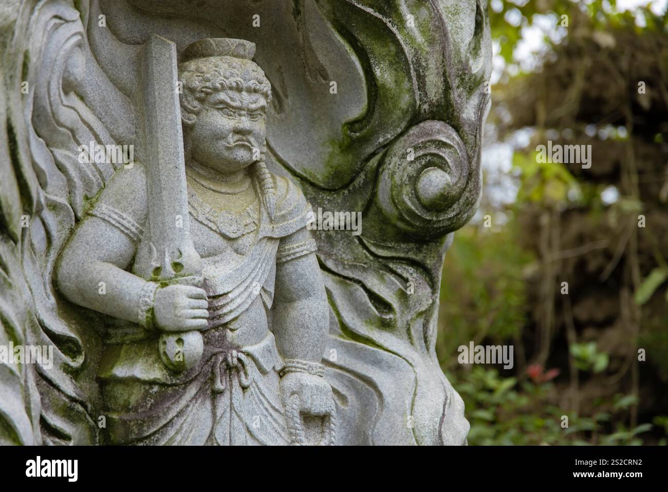 A religious stone statue of Acala at Japanese buddhism temple Stock ...
