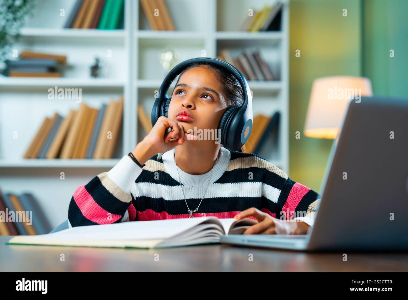 Studious Indian Asian Elementary Grade Girl Attending Virtual Online ...