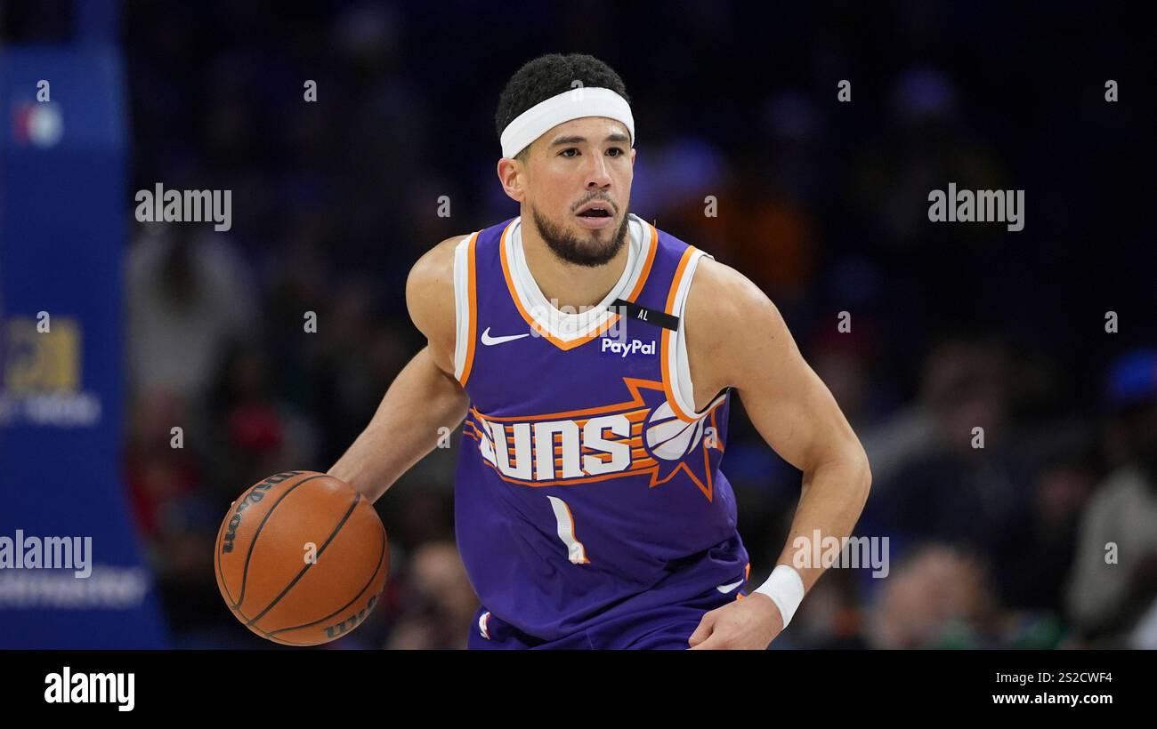 Phoenix Suns' Devin Booker plays during an NBA basketball game, Monday ...