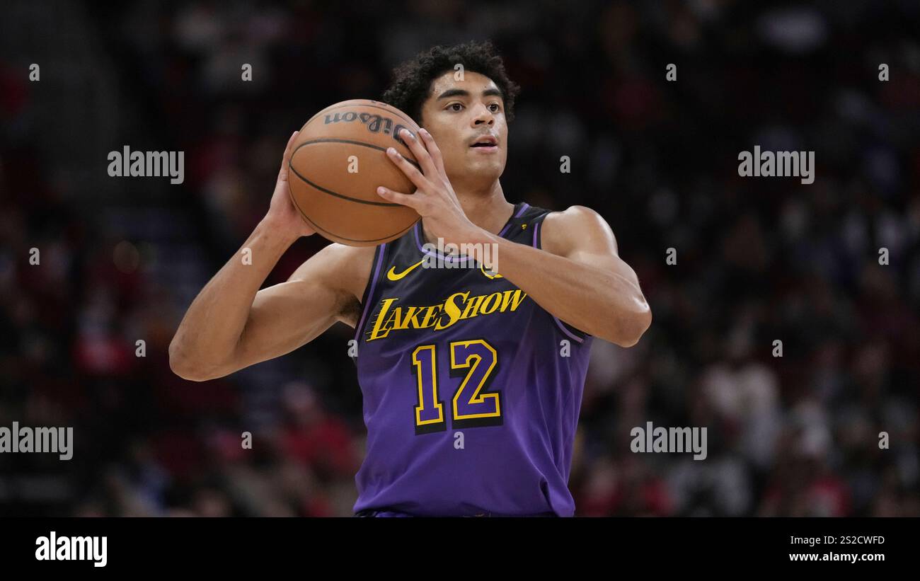 Los Angeles Lakers guard Max Christie controls the ball during an NBA ...