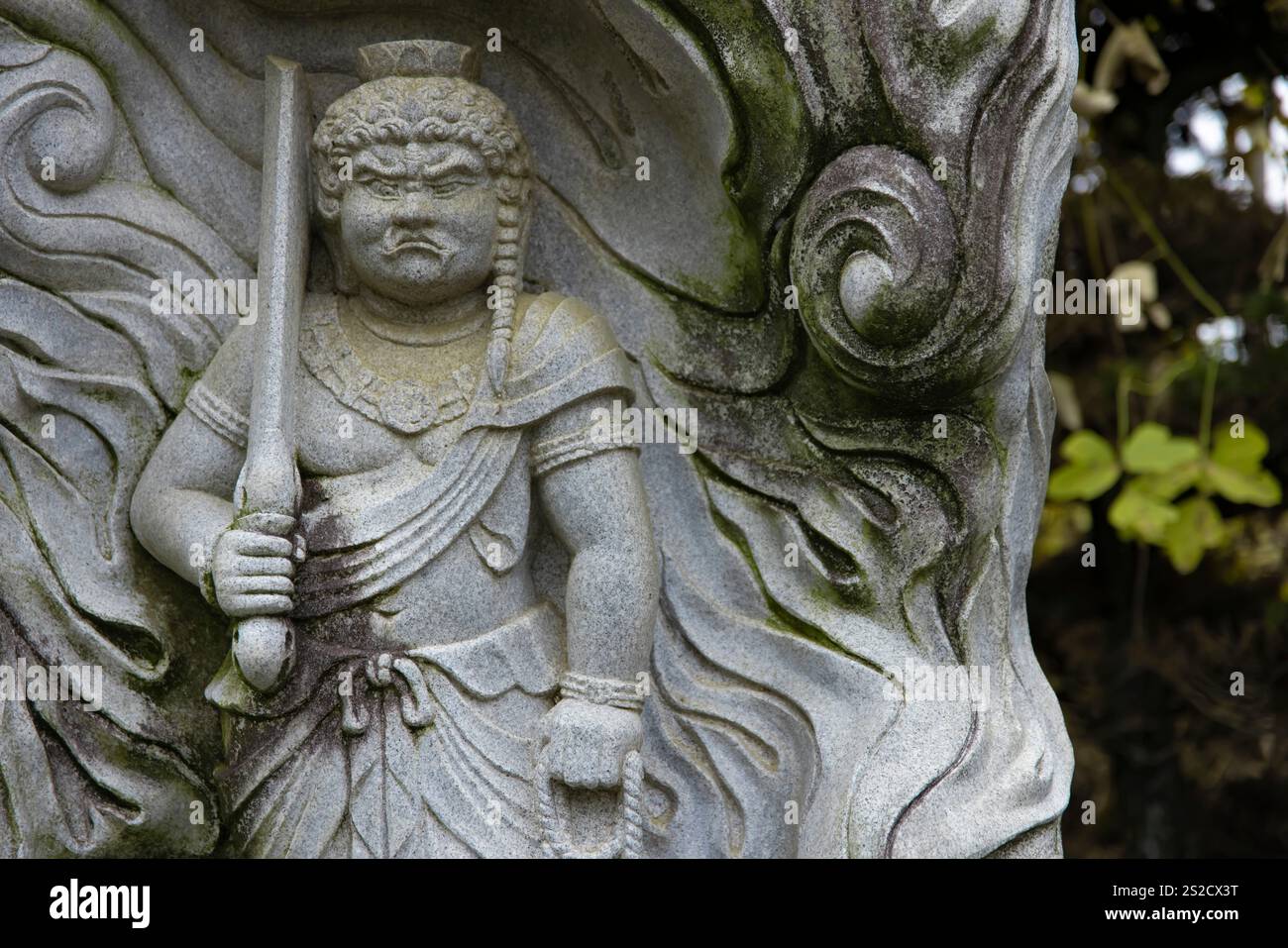 A religious stone statue of Acala at Japanese buddhism temple Stock ...