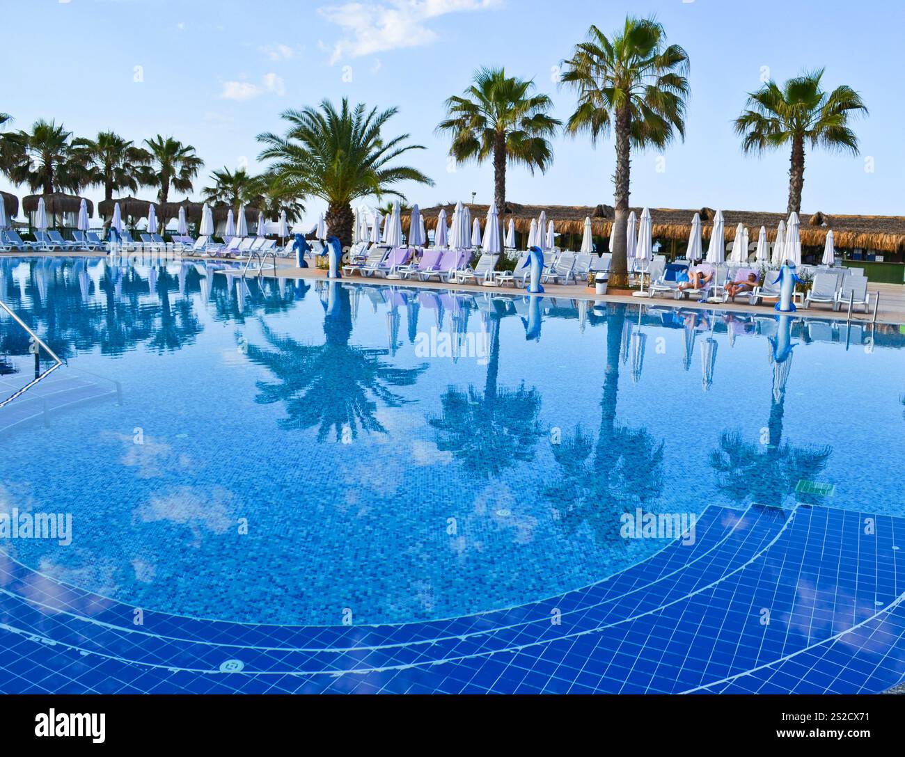 Water pool and chairs - vacation background Stock Photo - Alamy