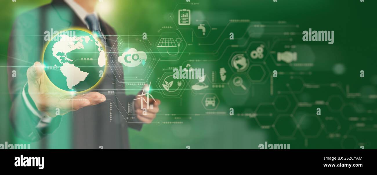 Businessman working virtual globe modern computer to reduce CO2 ...