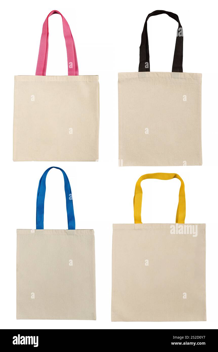 Beige canvas bags with multicolored handles are isolated on a white ...