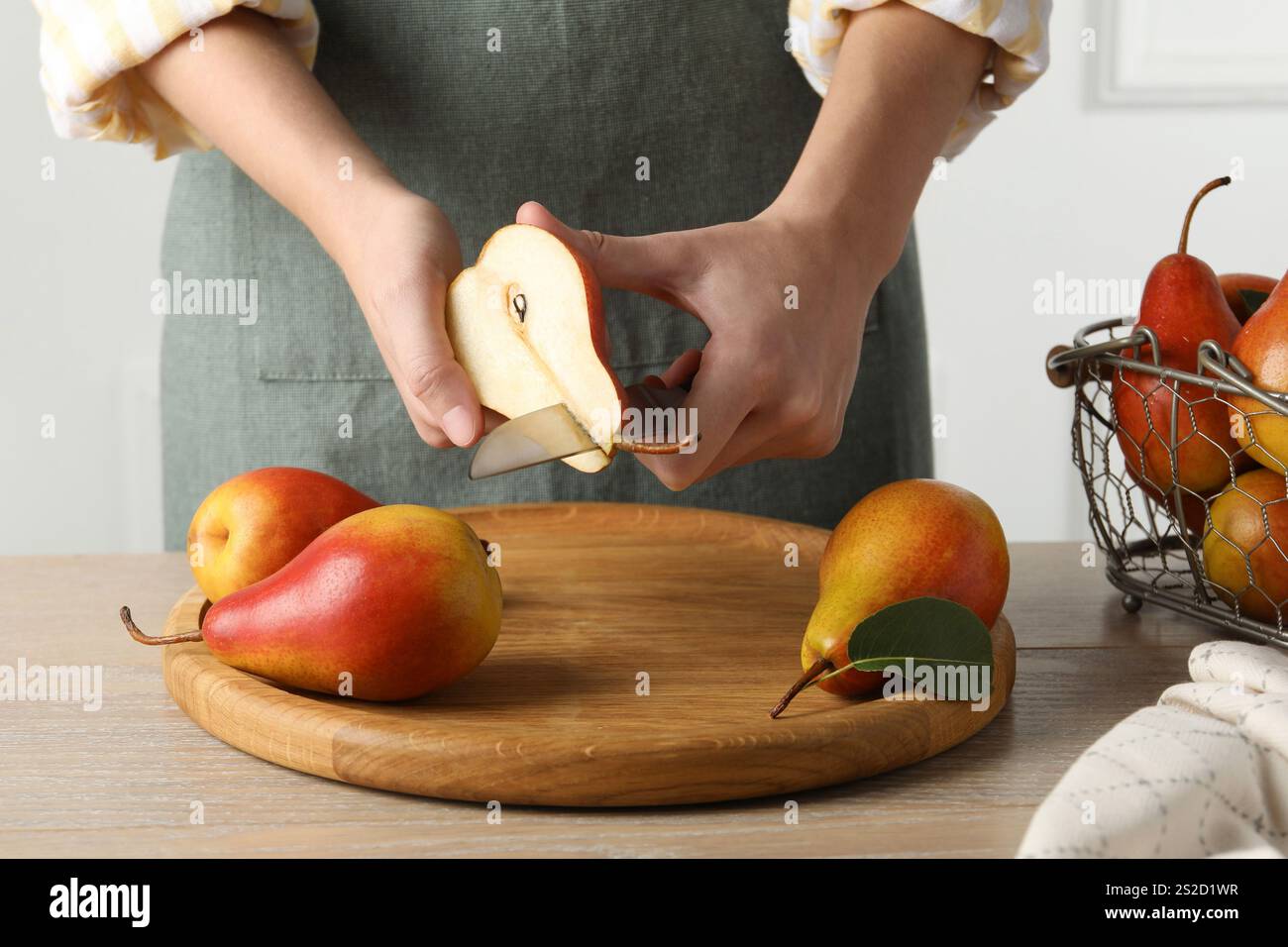 Woman cutting sweet yellow hi-res stock photography and images - Alamy