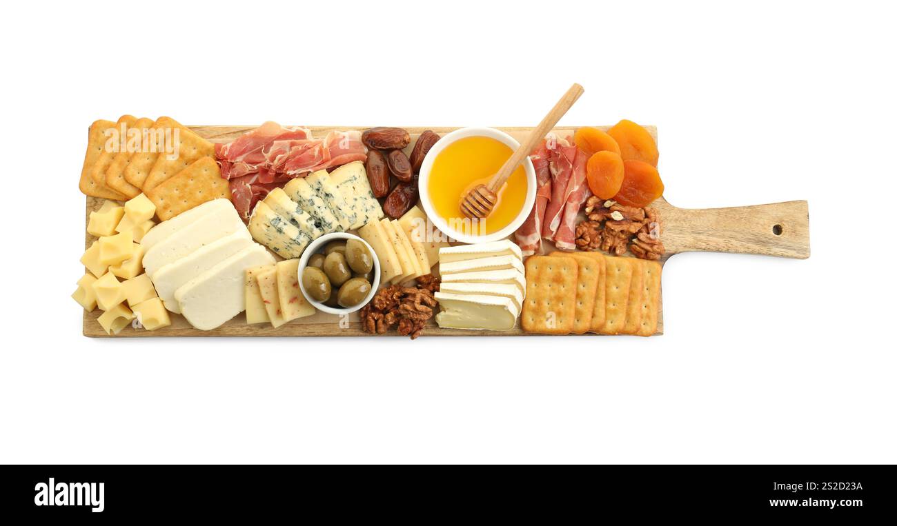 Different types of delicious cheese and other snacks isolated on white ...