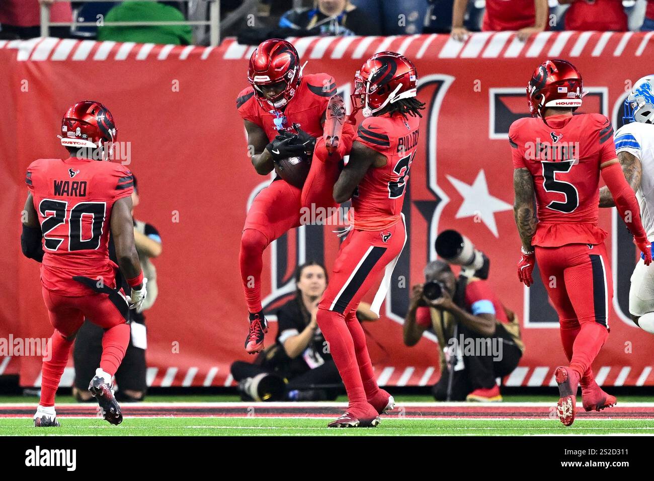 Houston Texans cornerback Kamari Lassiter (4) intercepts a pass during ...