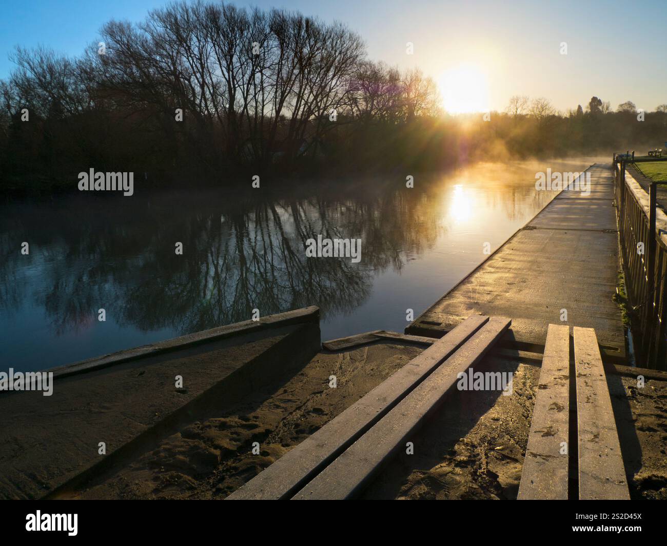 A deserted Radley Boathouse jetty by the Thames on a bitter cold and ...