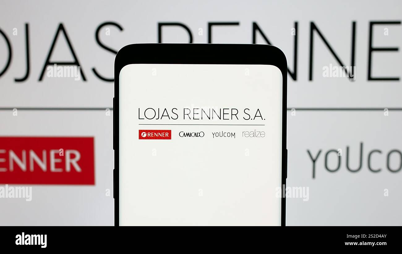 In this photo illustration, a mobile phone with the logo of Brazilian clothing company Lojas ...