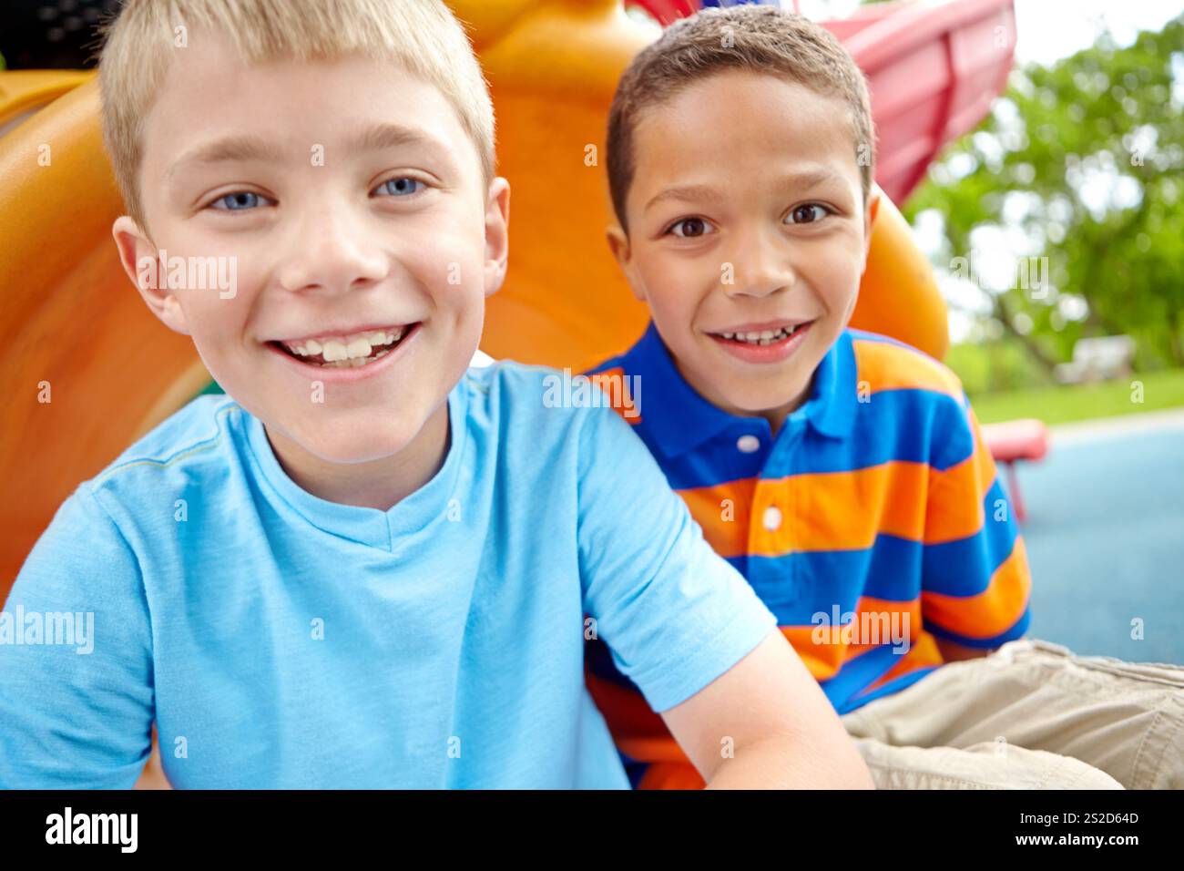 Happy kids, portrait or boys with friends in playground playing on ...