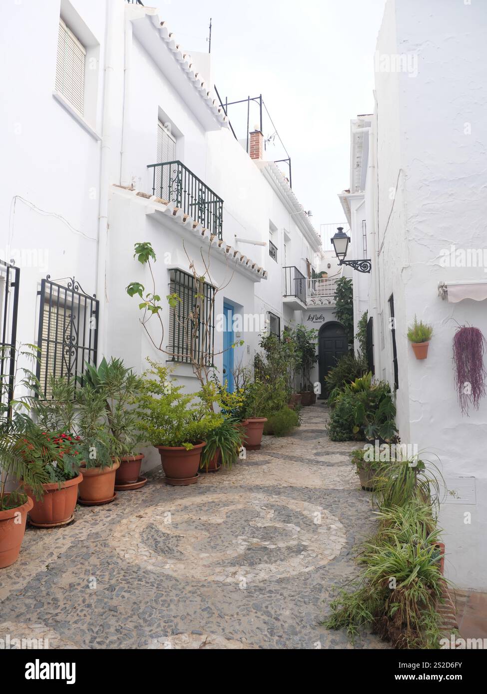 Old historical gate entrance to a house in Competa a white town in ...