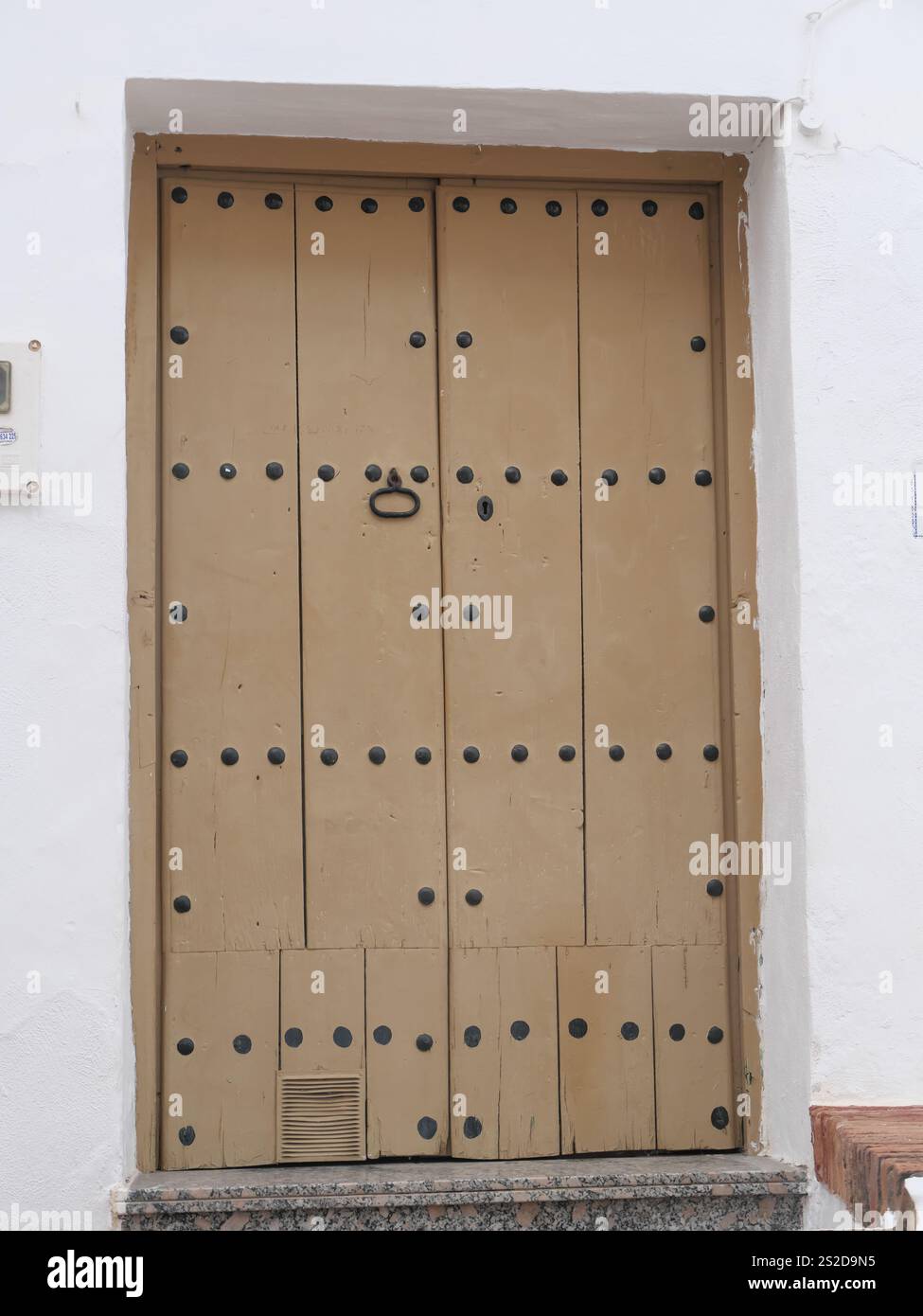 Old historical door in Competa a white town in Andalusia Spain Stock ...