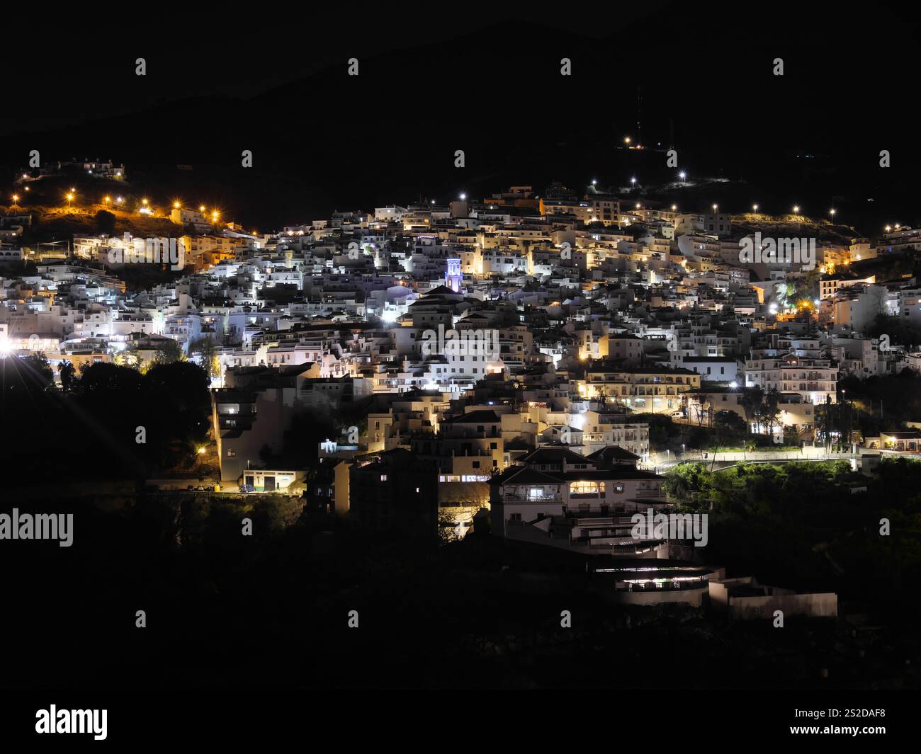 View of night illuminated Competa of a white town in Andalusia Spain ...