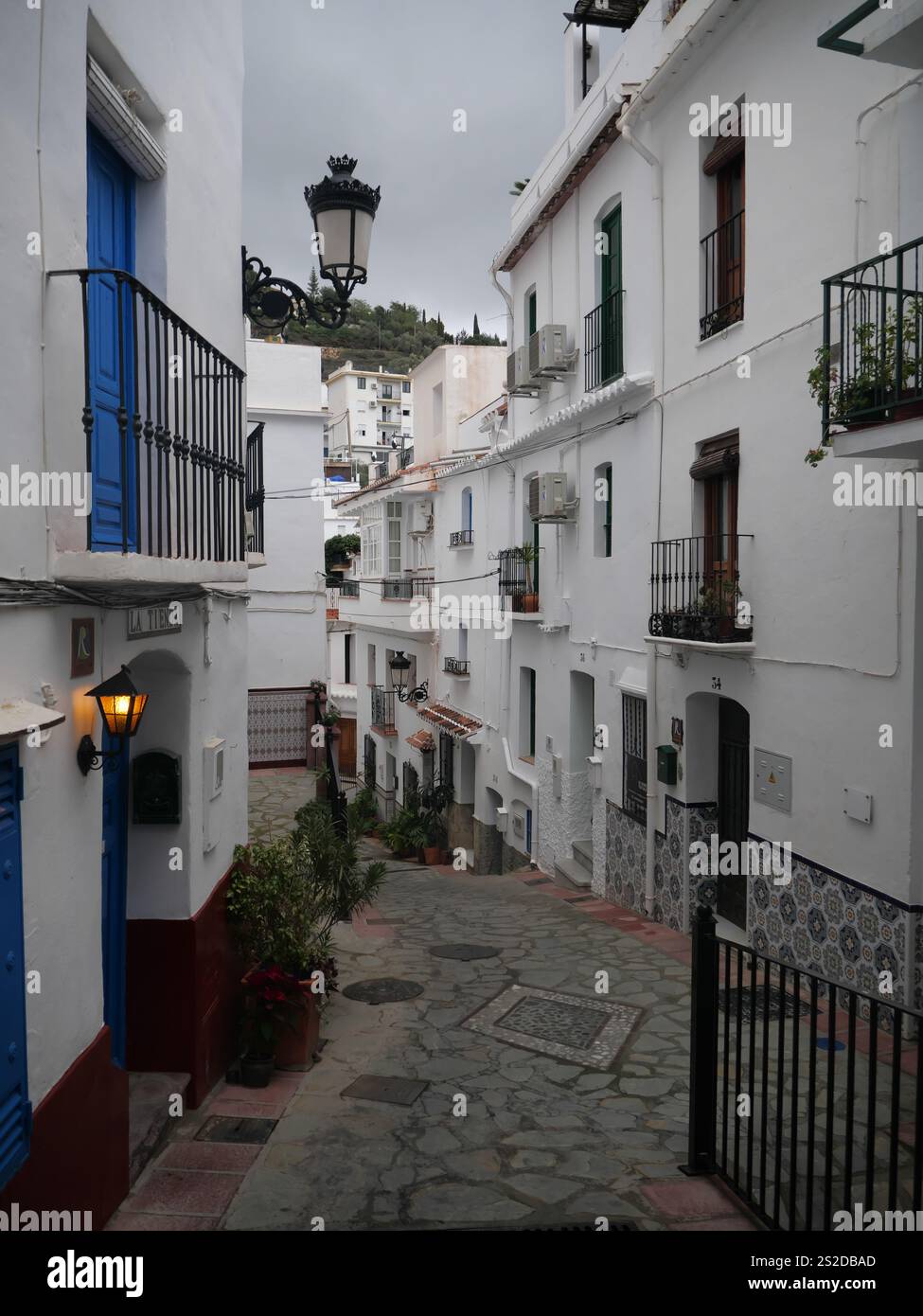 View into typical alley in Competa a white town in Andalusia Spain ...