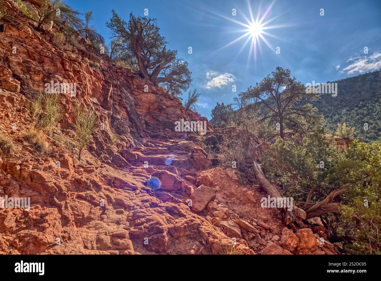 Sunburst over Rocky path along Bell Trail, Wet Beaver Creek, Coconino ...