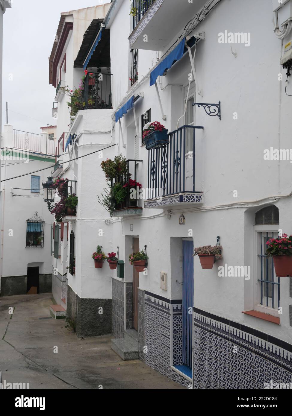 View into typical alley in Competa a white town in Andalusia Spain ...
