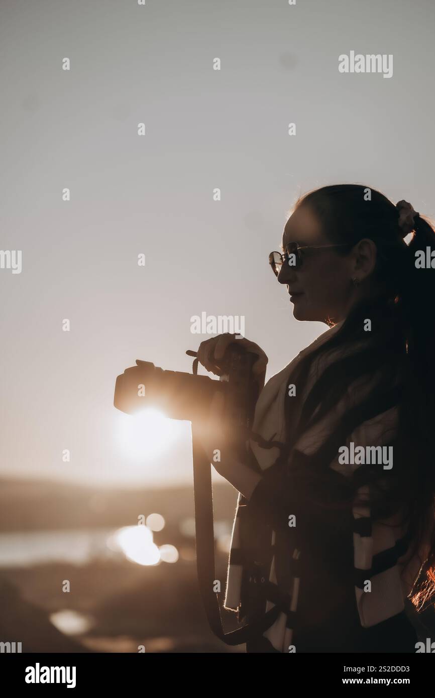 The photo captures a woman deeply immersed in the process of ...
