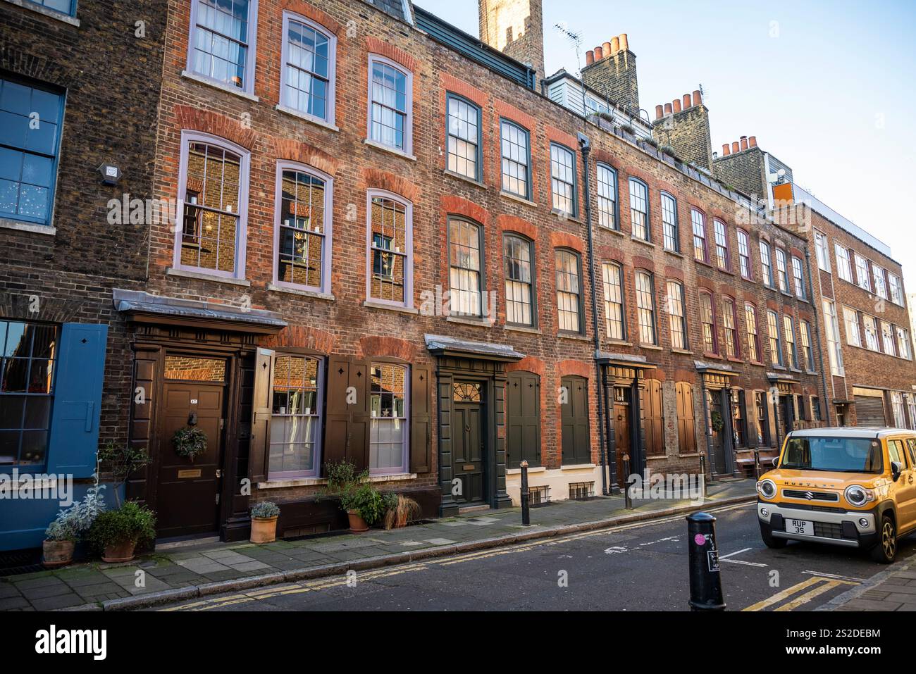 Gentrified street of terrace houses in East End, London, England, UK ...