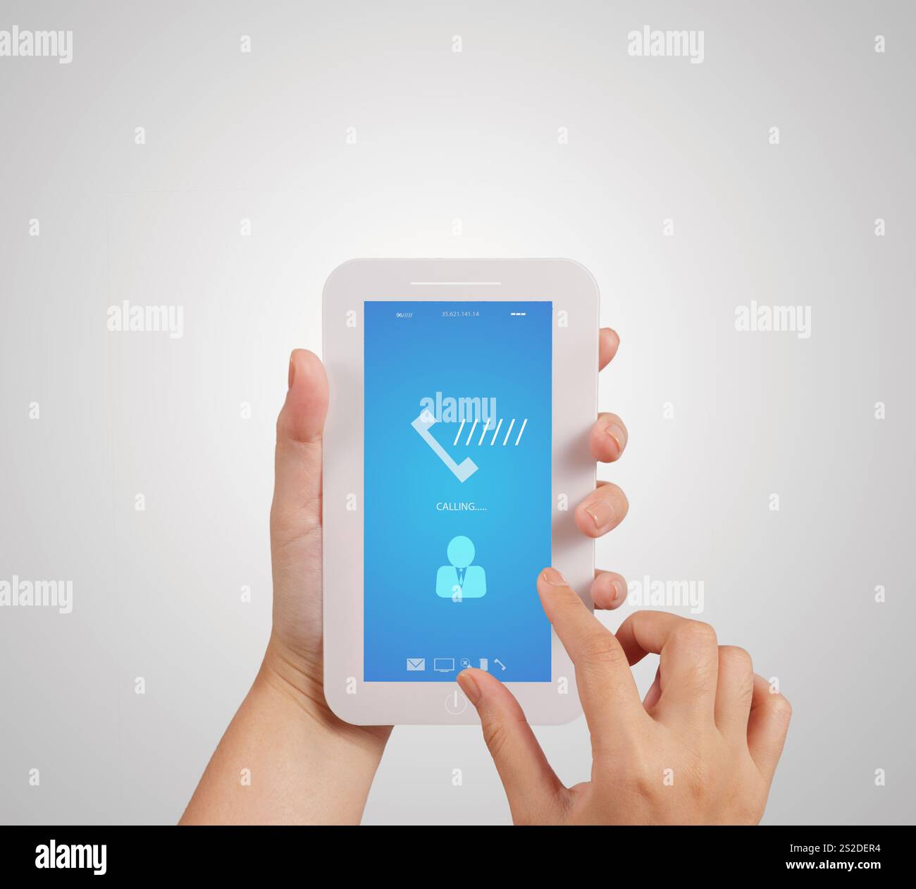 hand holding a touch phone with blue screen and the phone ringing icon ...