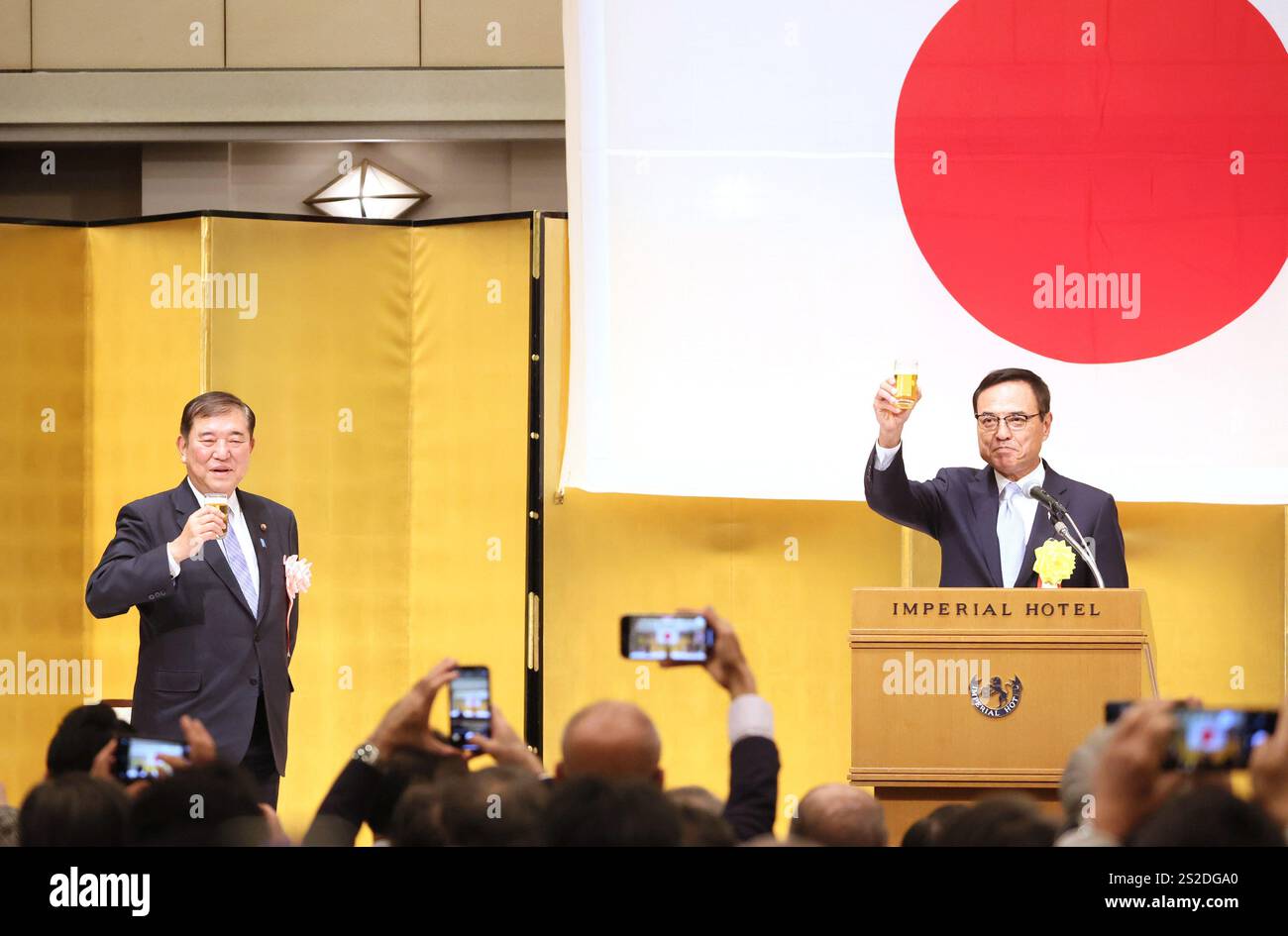 Tokyo, Japan. 7th Jan, 2025. Japanese Prime Minister Shigeru Ishiba (L ...