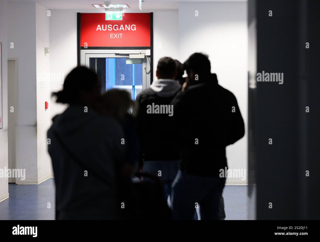 Berlin, Germany. 07th Jan, 2025. Visitors wait in a corridor at the ...