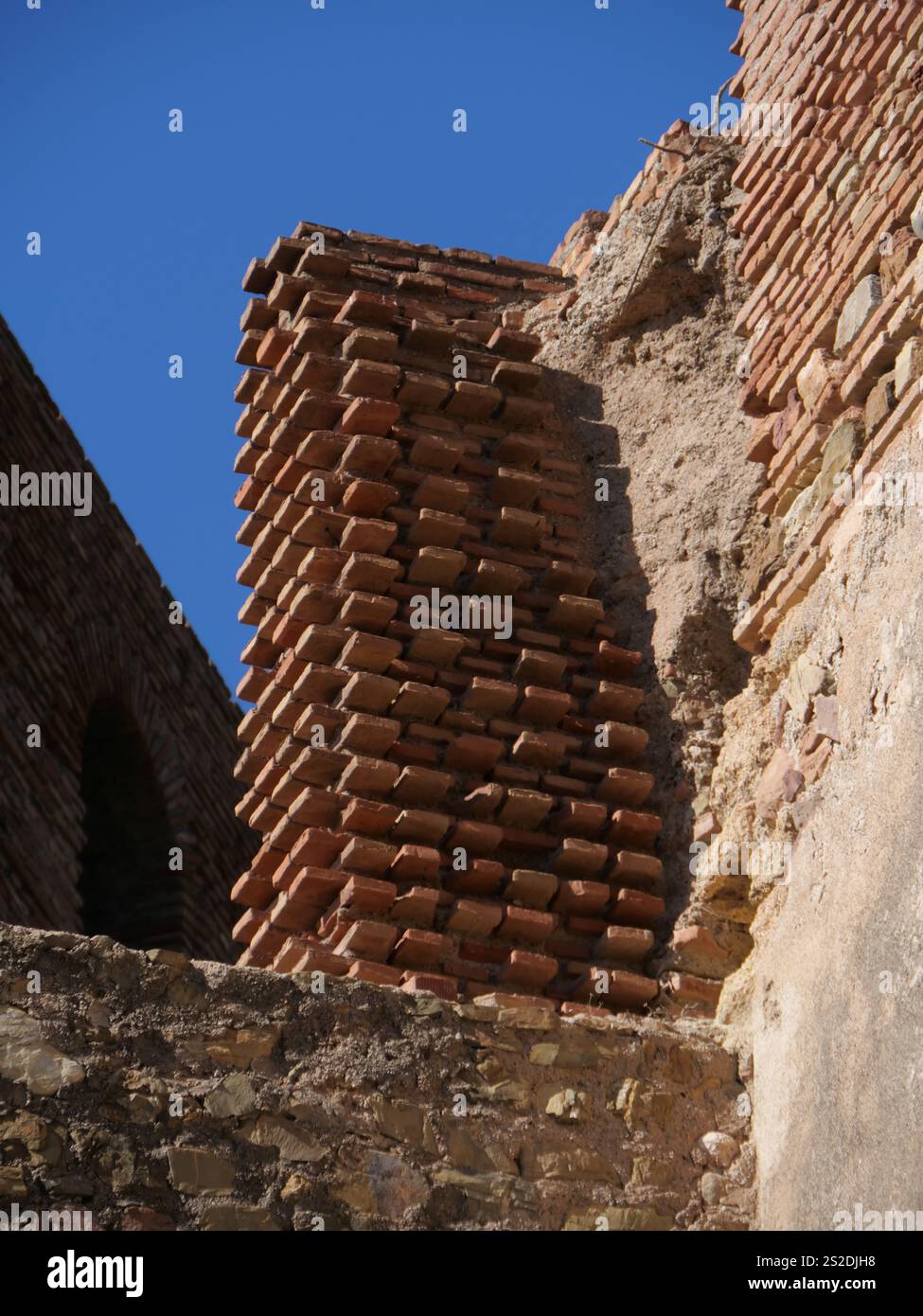 Old outer walls of the Castillo de Gibralfaro castle complex in Malaga ...