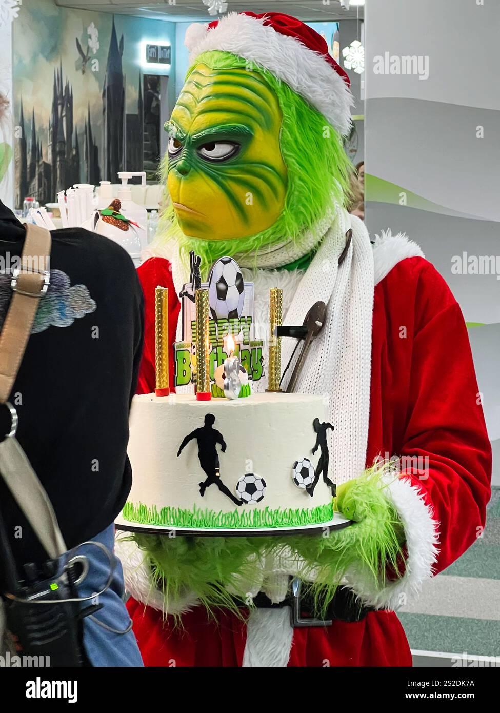 Kyiv, Ukraine - January 07, 2025: Humorous scene of a green-costumed ...