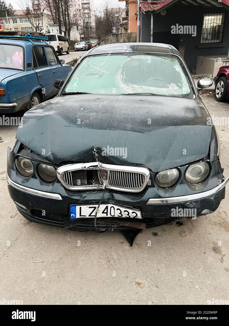 Kyiv, Ukraine - January 07, 2025: A severely damaged Rover 75 vehicle ...