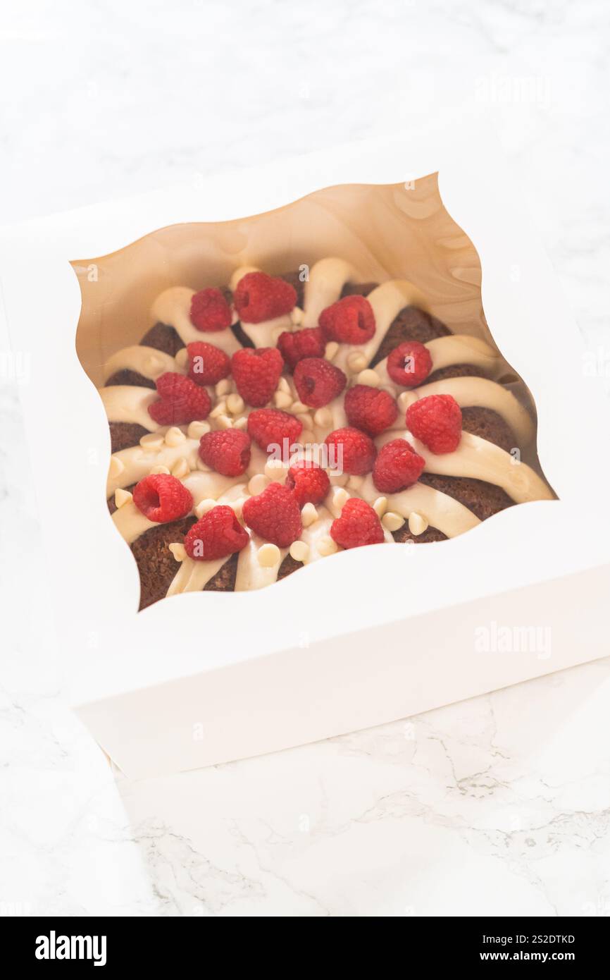 Gift of Delight - White Chocolate Raspberry Bundt Cake Stock Photo - Alamy