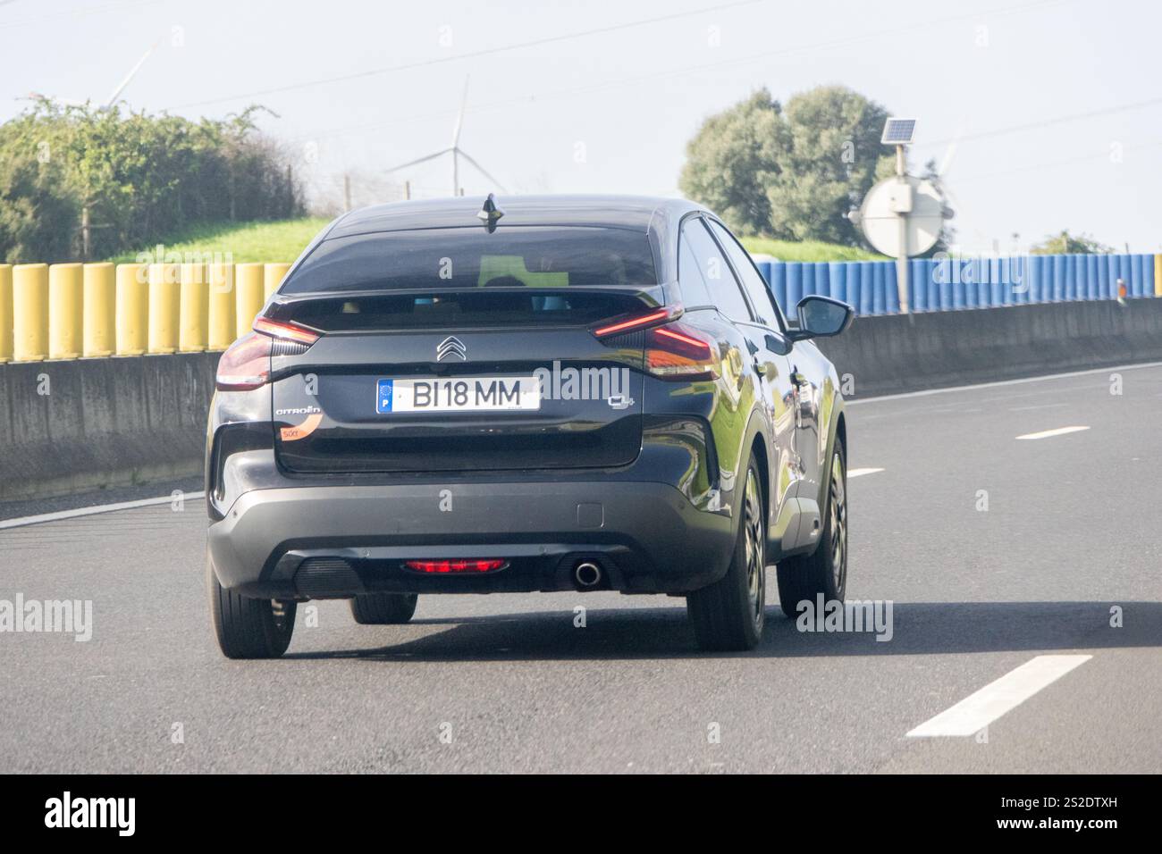 Back view of modern citroen c4 driving on highway Stock Photo - Alamy