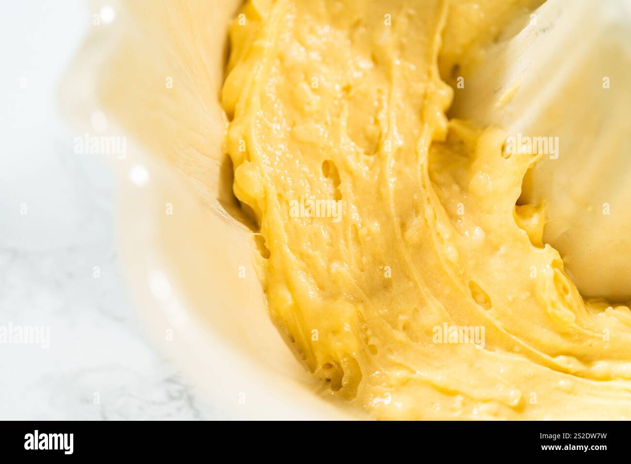 Filling and Flavor - Bundt Cake Delights Await Stock Photo - Alamy