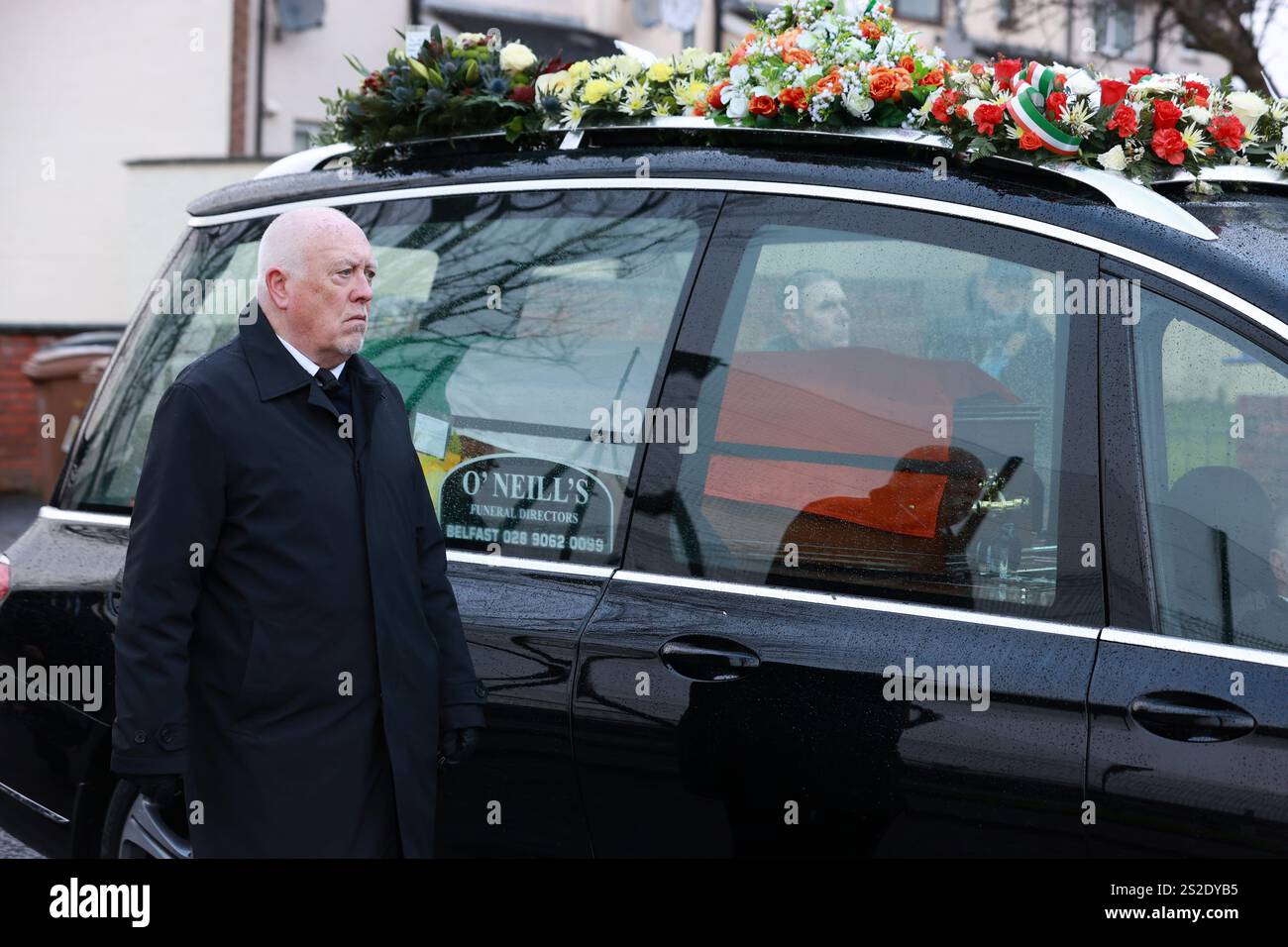 The funeral cortege of Ted Howell is given a guard of honour as it ...