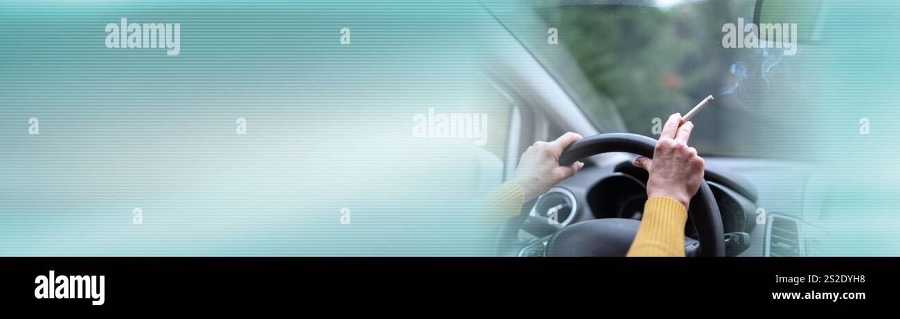 Woman smoking a cigarette while driving; panoramic banner Stock Photo ...