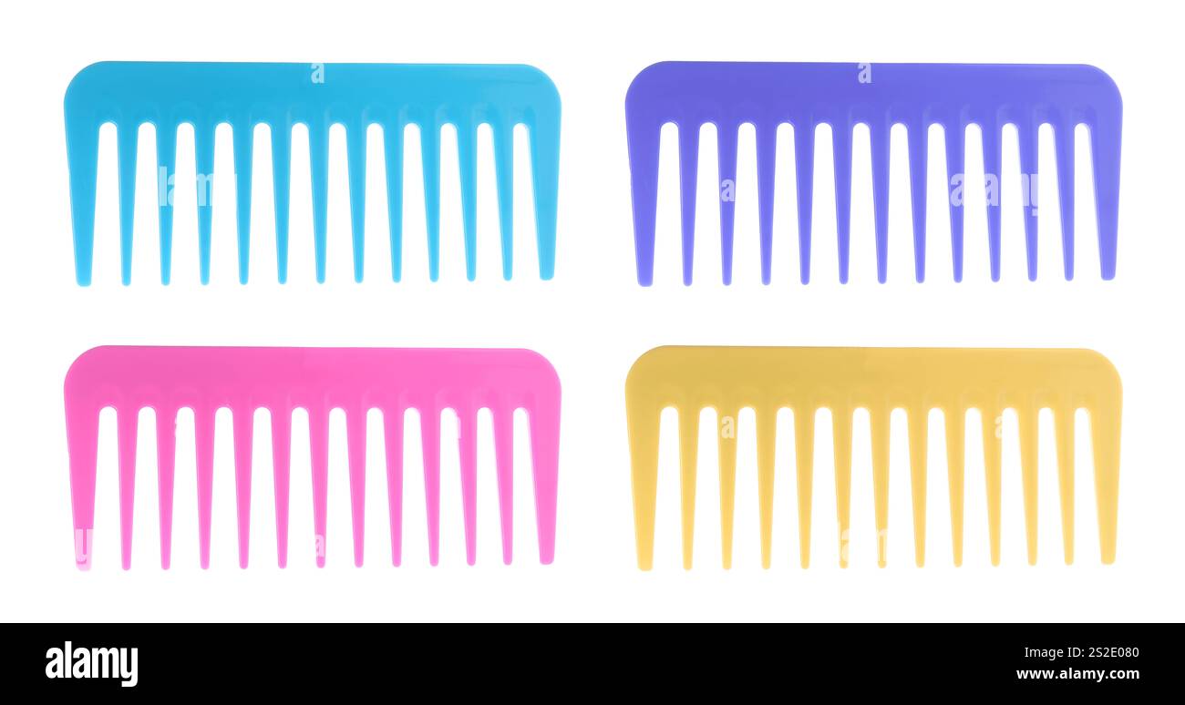 Combs of different colors isolated on white Stock Photo - Alamy