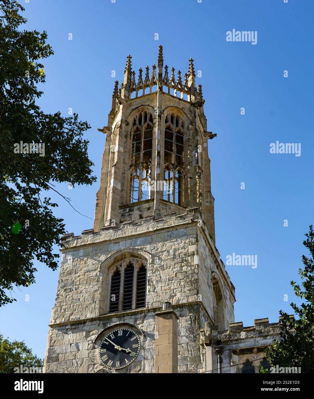 The Lantern and upper part of tower with clock of All Saints Church ...