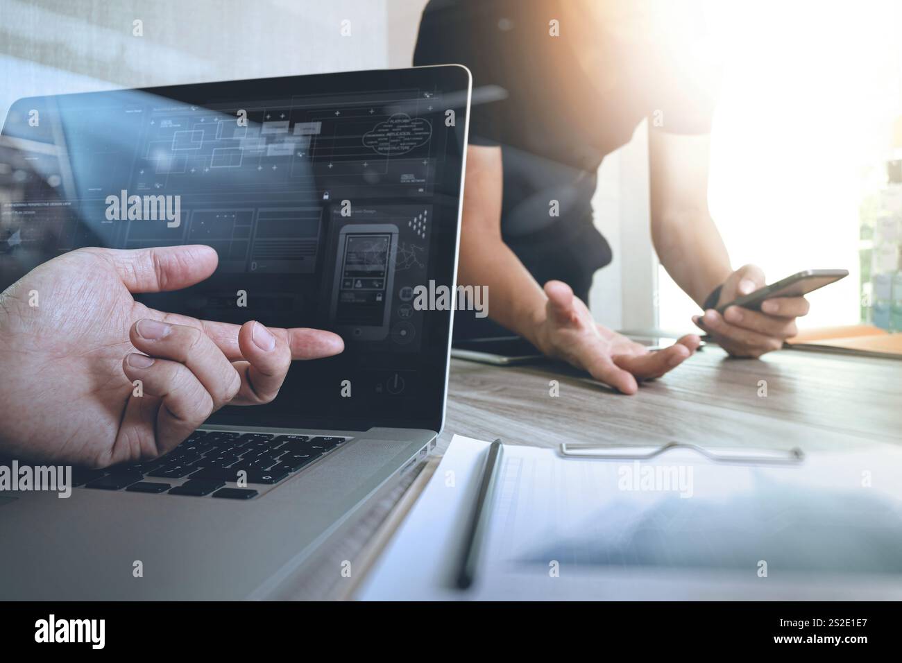 Businessman hand making presentation with his colleagues and business ...