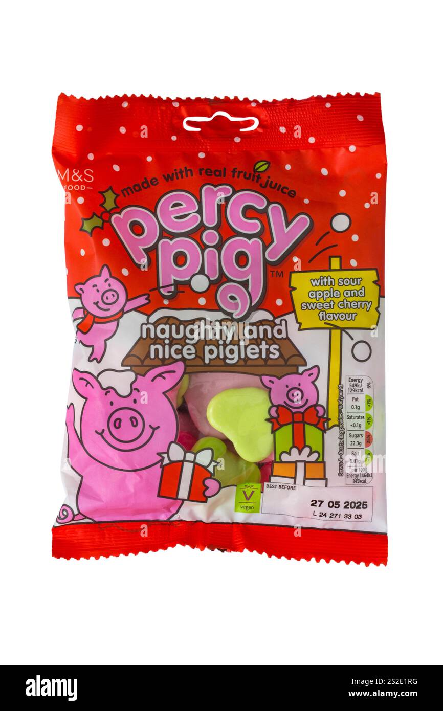 Bag of M&S Percy Pig naughty and nice piglets sweets candies isolated on white background Stock ...