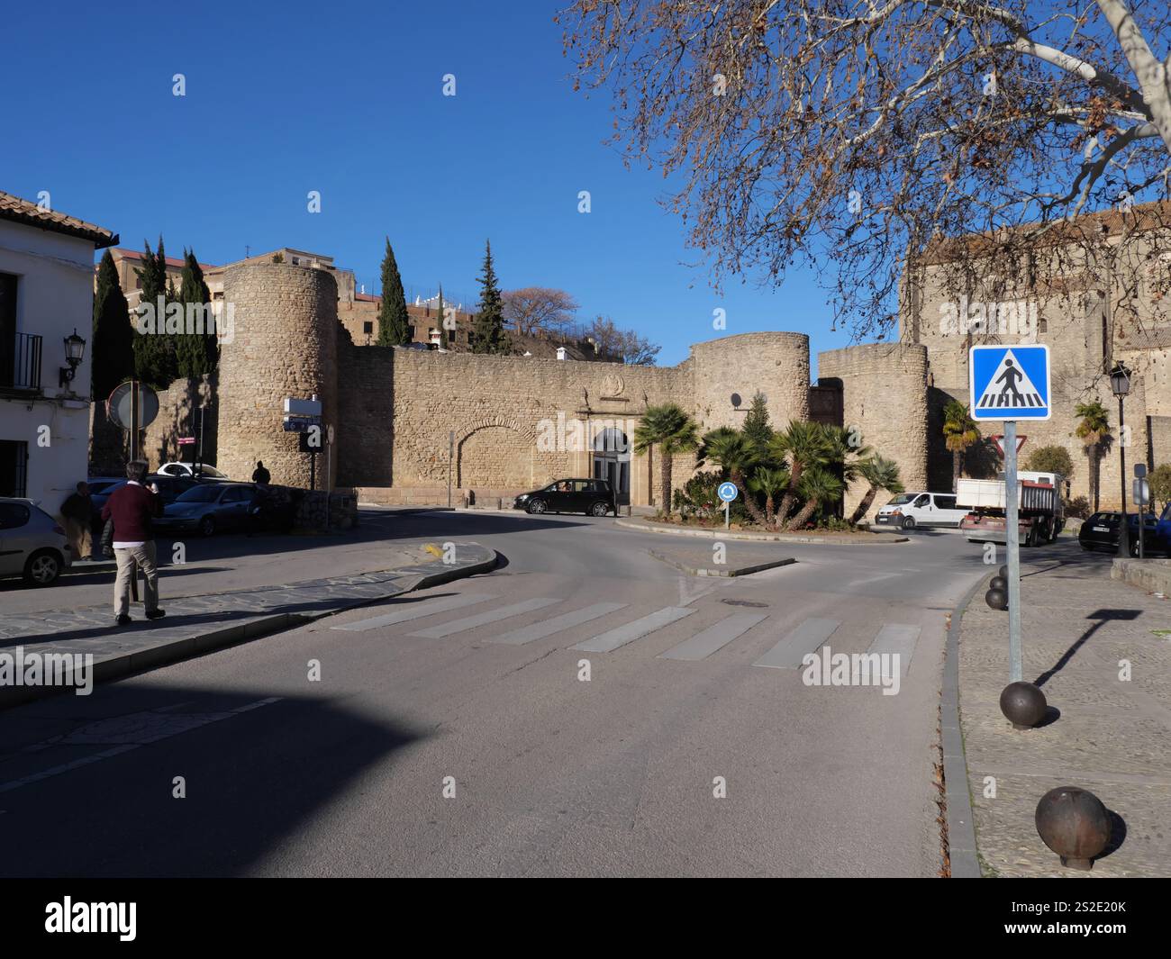 Old city wall and gate entrance to the old town of Ronda, Spain Stock ...