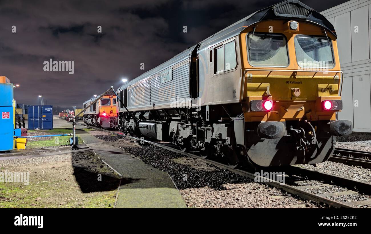 Freight train performing duties Stock Photo - Alamy