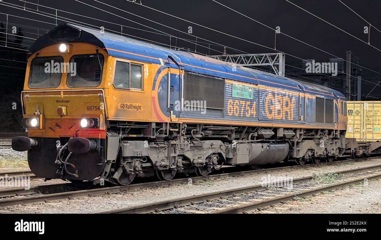 Freight train performing duties Stock Photo - Alamy