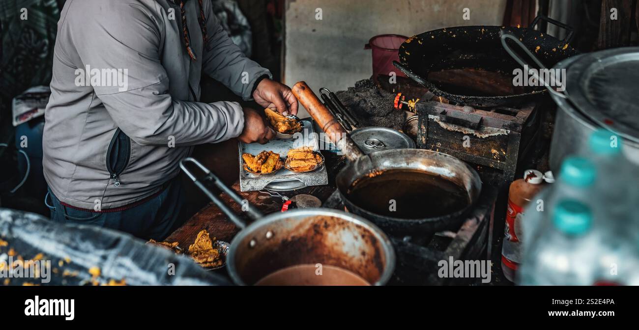 indian man cooking traditional food Stock Photo - Alamy