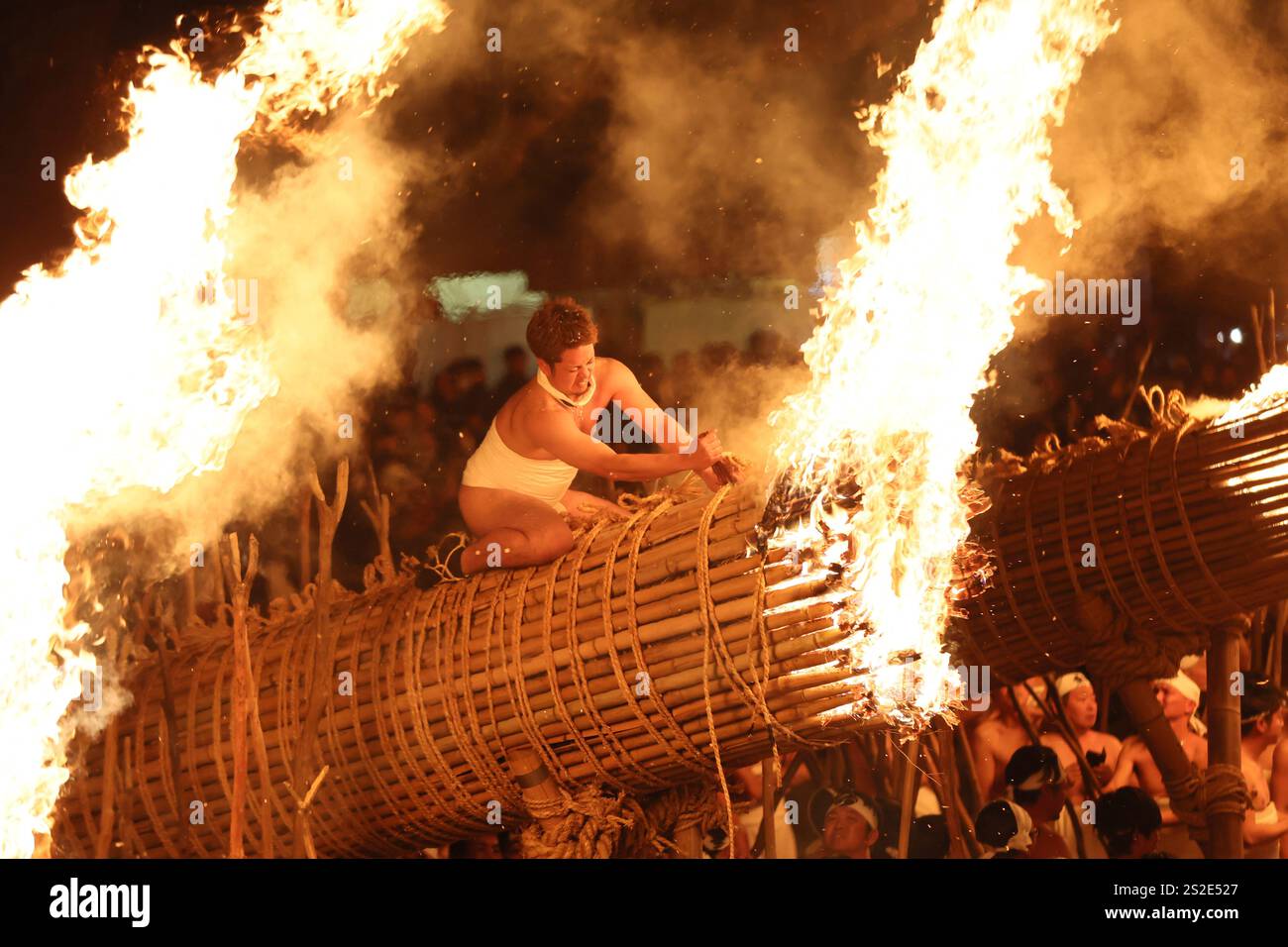 Huge torches are lit all at once to burst into flames during a fire ...